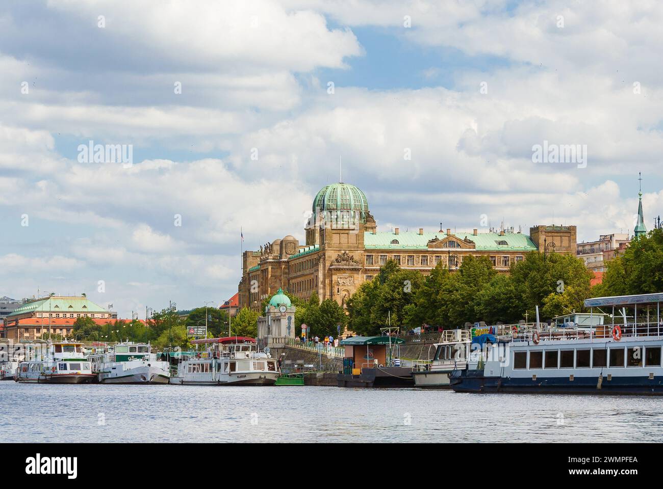 Ministry of Industry and Trade and river boats pier along Vltava River ...