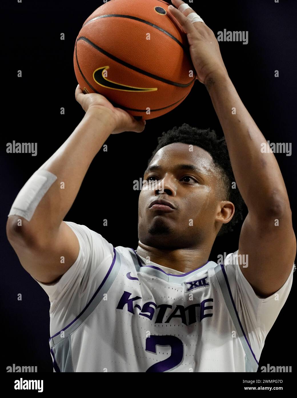 Kansas State guard Tylor Perry shoots during the second half of an NCAA ...