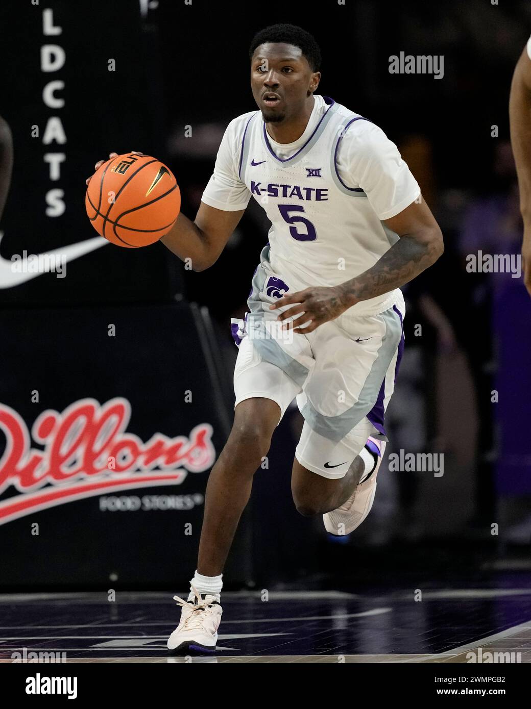 Kansas State guard Cam Carter drives during the second half of an NCAA ...