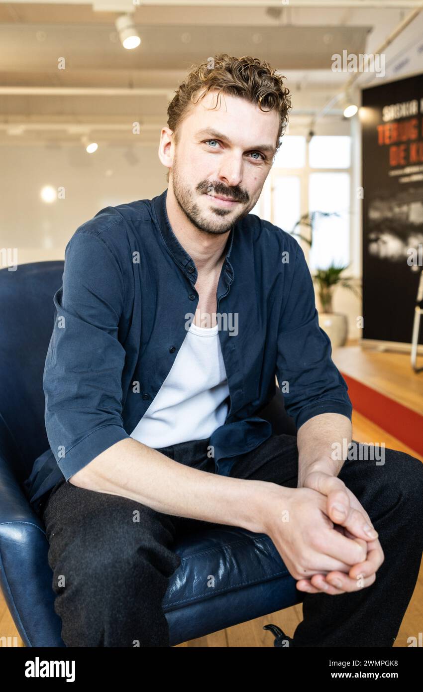 AMSTERDAM - Illustrator Mathieu Schellekens during the presentation of ...