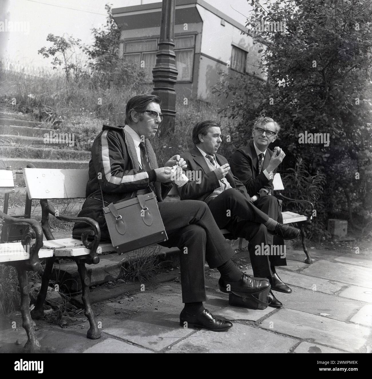 1970s, historical, three male suited transport workers, either tube or ...