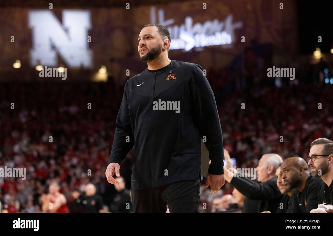 Minnesota head coach Ben Johnson watches as his team plays against ...