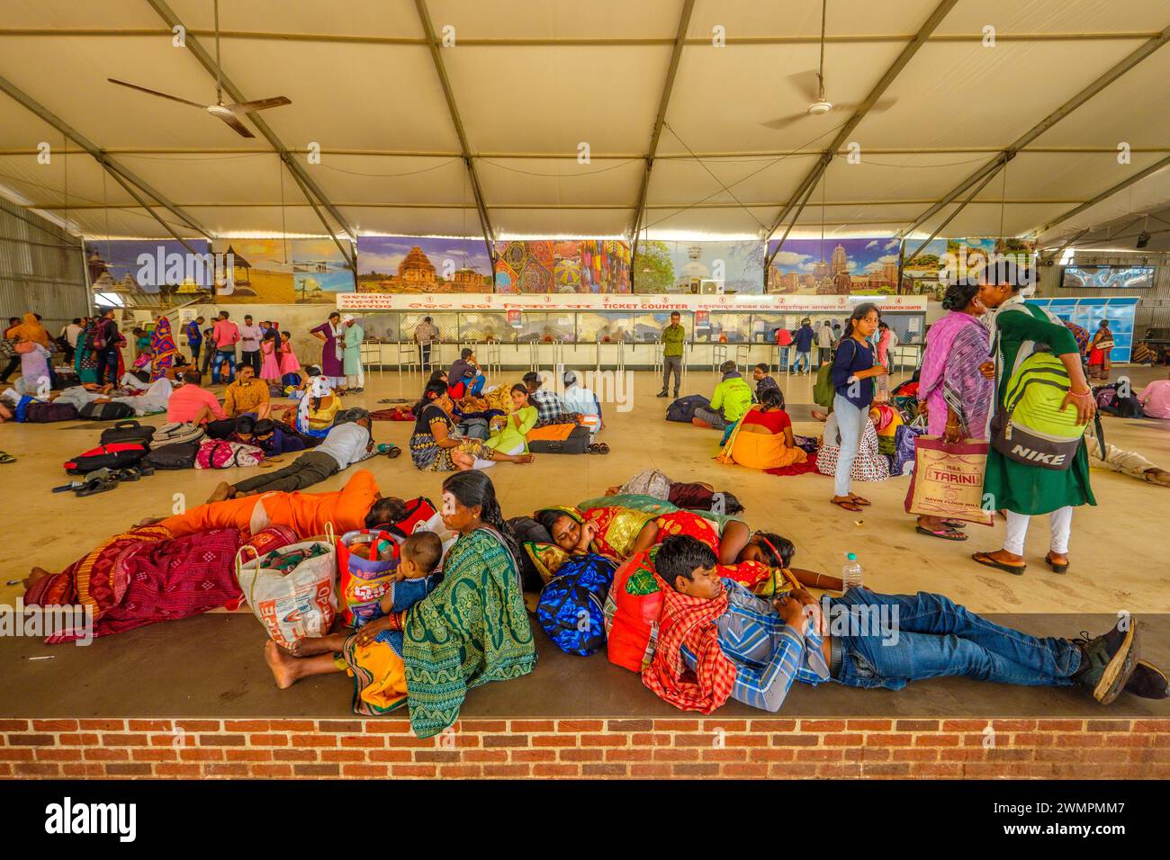 Passengers waiting in the booking hall of Bhubaneswar station on the ...