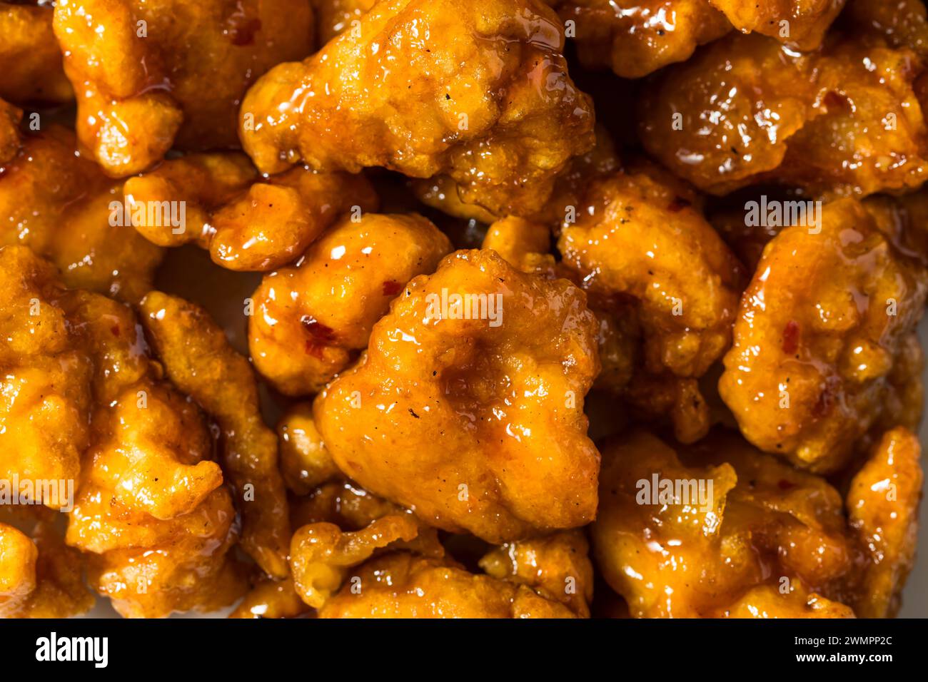 Deep Fried Asian Orange Chicken with Chopsticks Stock Photo - Alamy