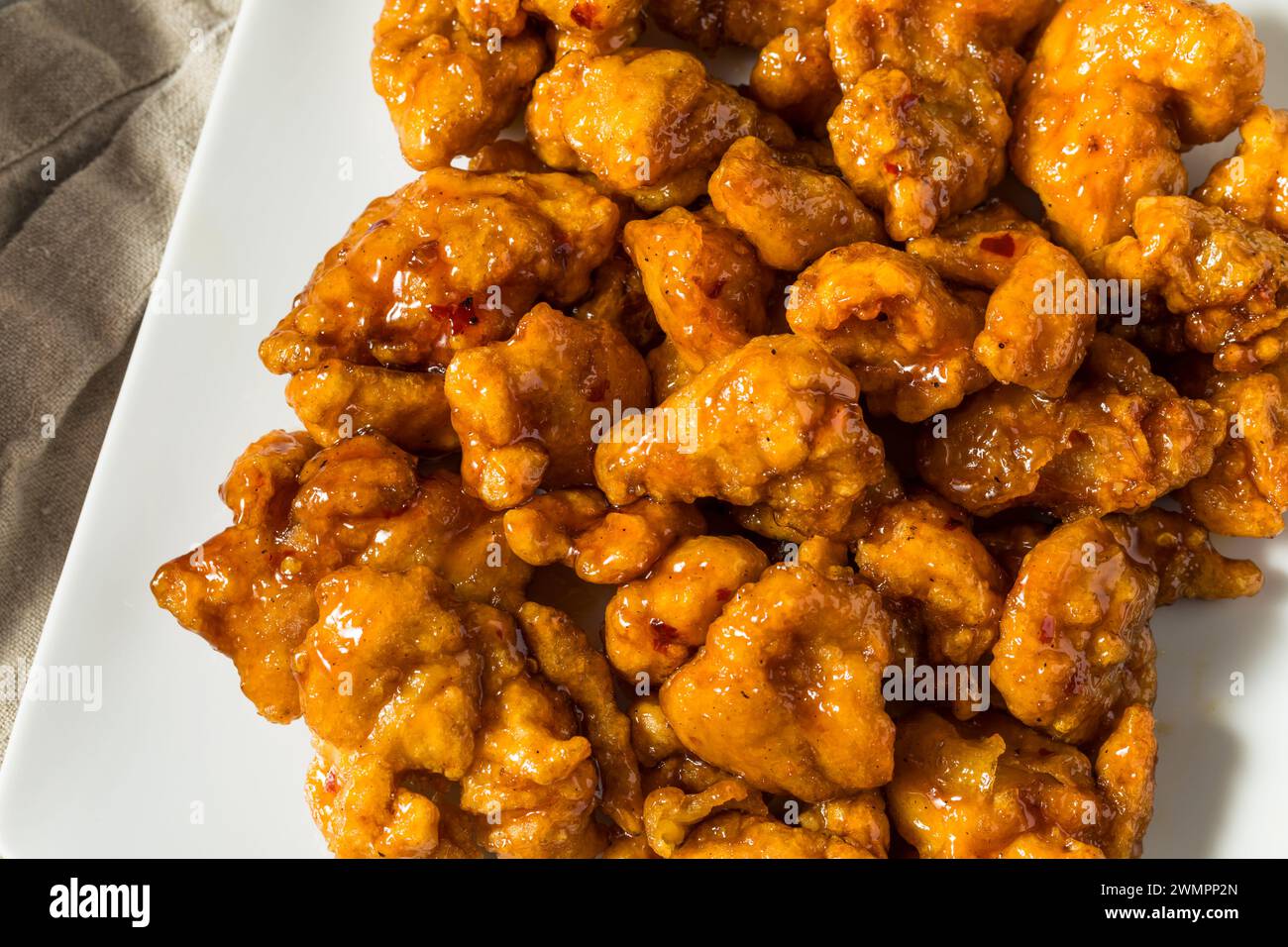 Deep Fried Asian Orange Chicken with Chopsticks Stock Photo - Alamy