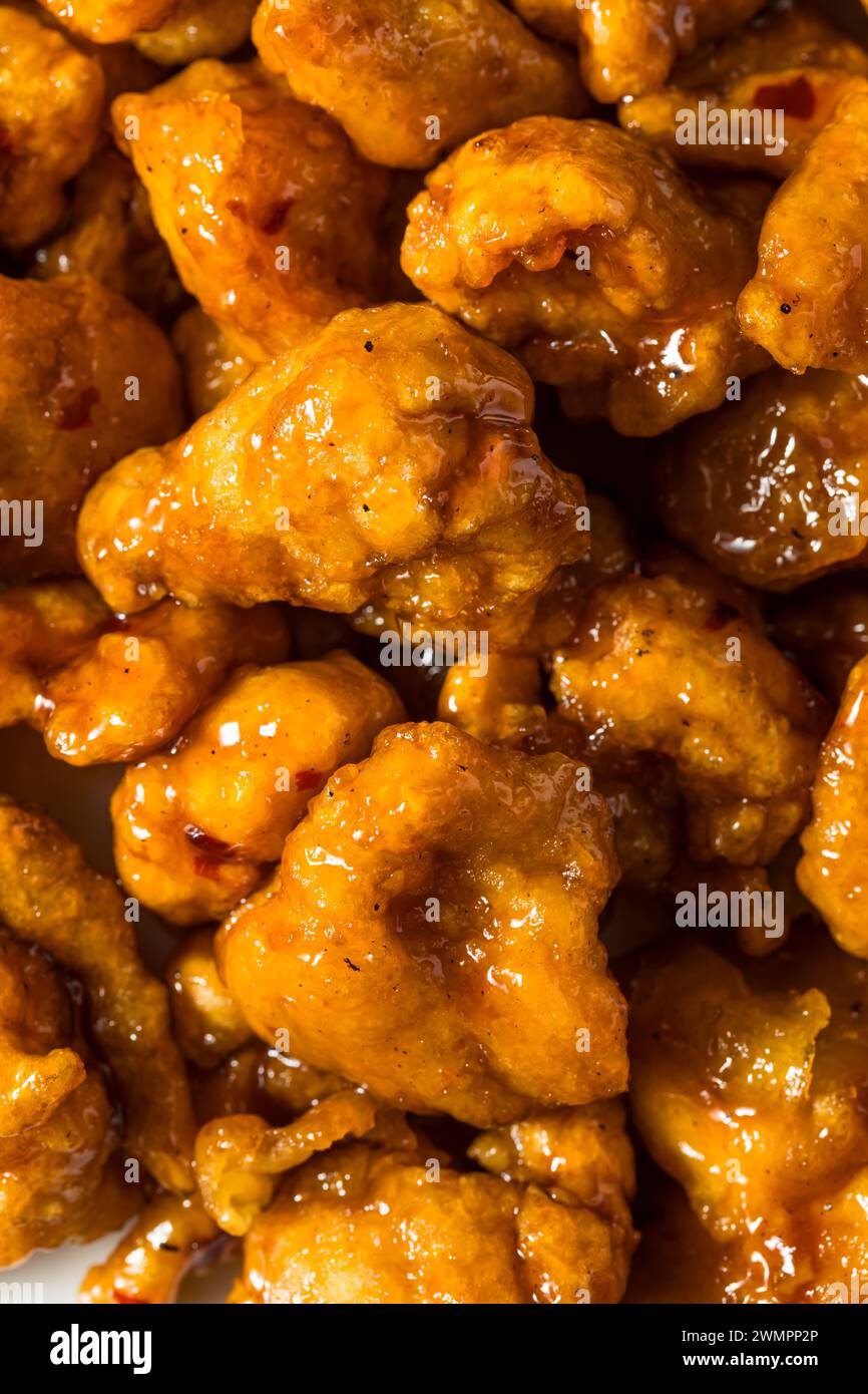 Deep Fried Asian Orange Chicken with Chopsticks Stock Photo - Alamy
