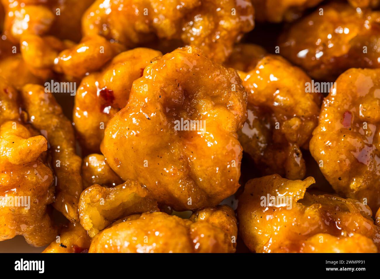 Deep Fried Asian Orange Chicken with Chopsticks Stock Photo - Alamy