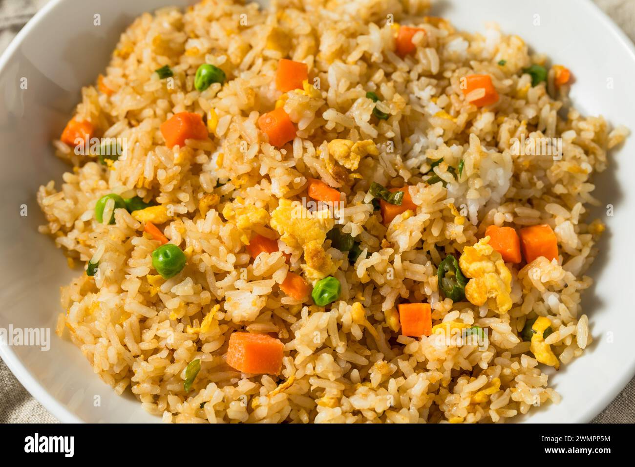 Homemade Chinese Asian Fried Rice with Peas and Carrots Stock Photo - Alamy