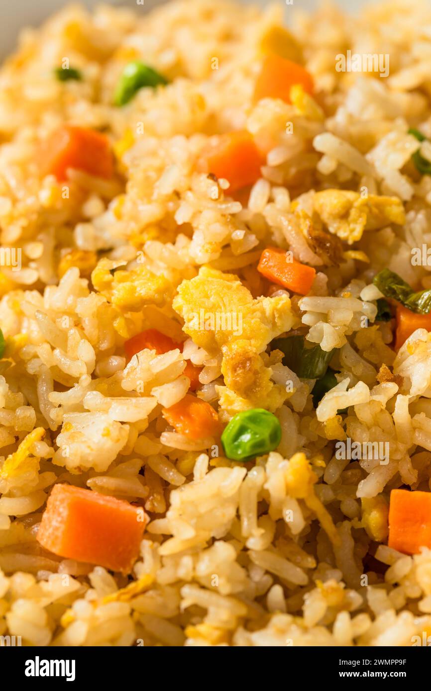Homemade Chinese Asian Fried Rice with Peas and Carrots Stock Photo - Alamy