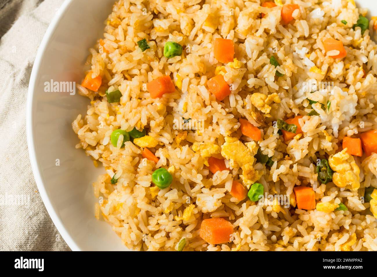 Homemade Chinese Asian Fried Rice with Peas and Carrots Stock Photo - Alamy