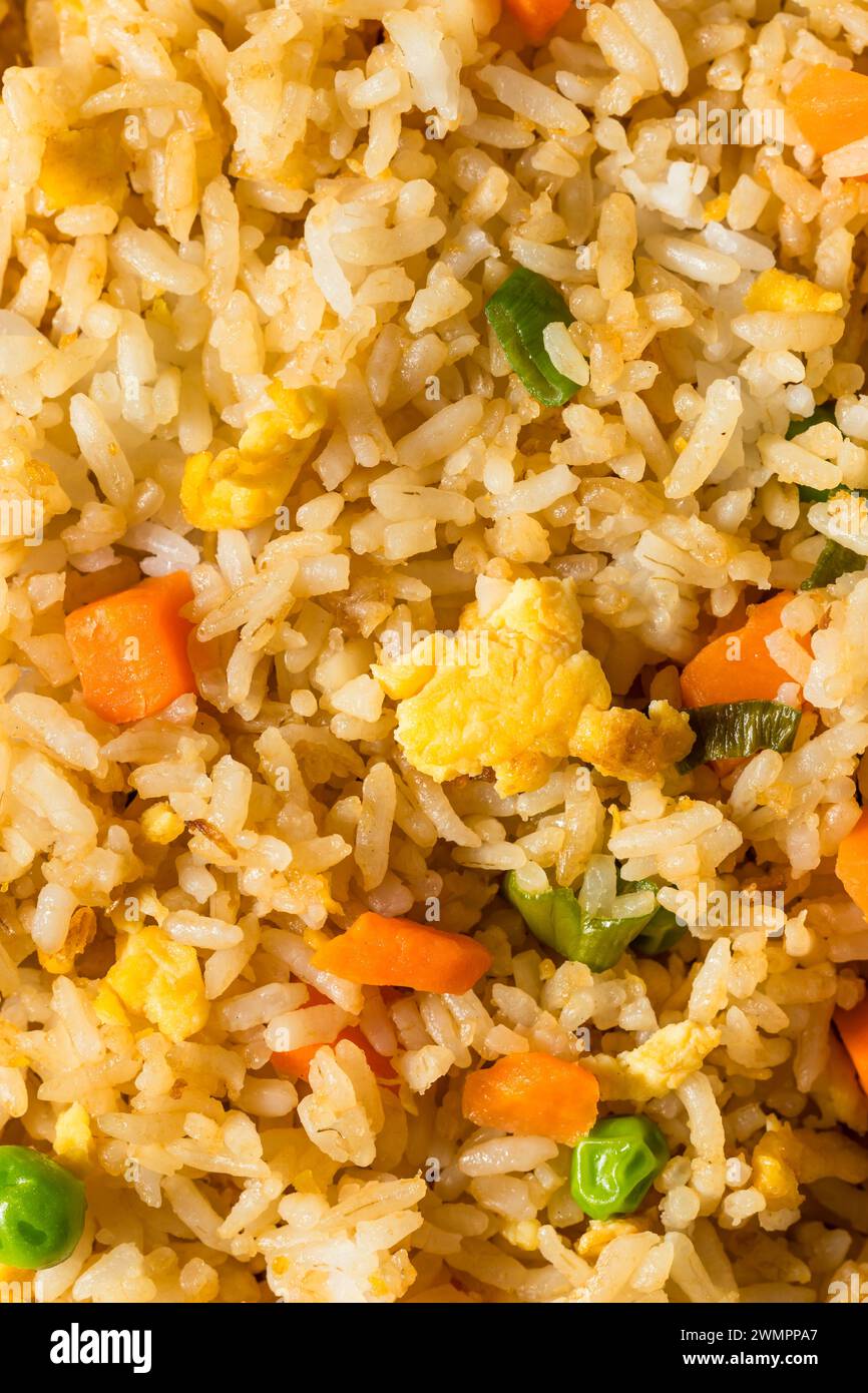 Homemade Chinese Asian Fried Rice with Peas and Carrots Stock Photo - Alamy