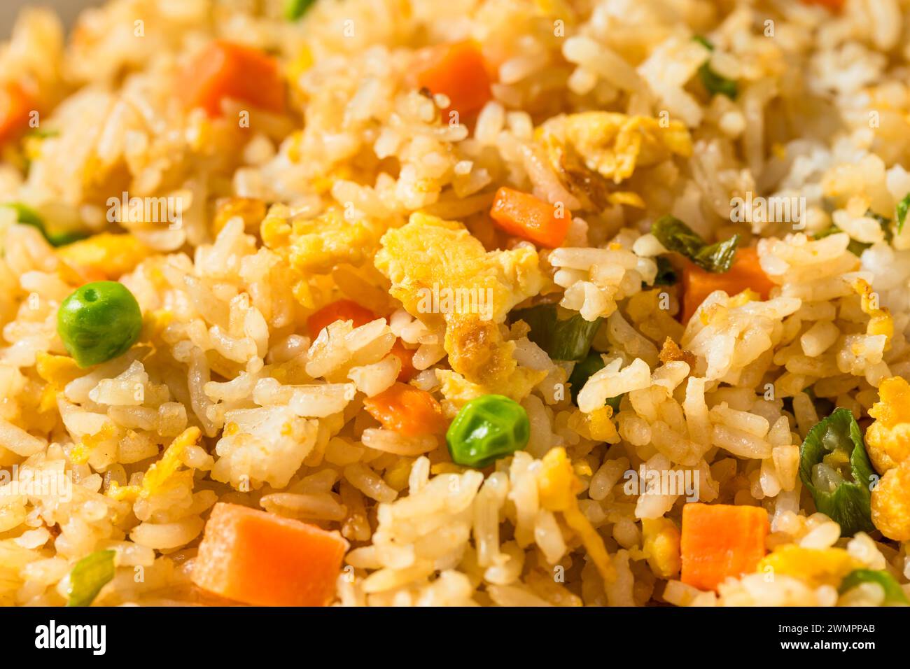 Homemade Chinese Asian Fried Rice with Peas and Carrots Stock Photo - Alamy