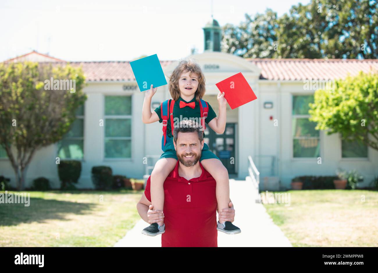 Father walking son to school. Parent get a son pupil piggyback ride ...