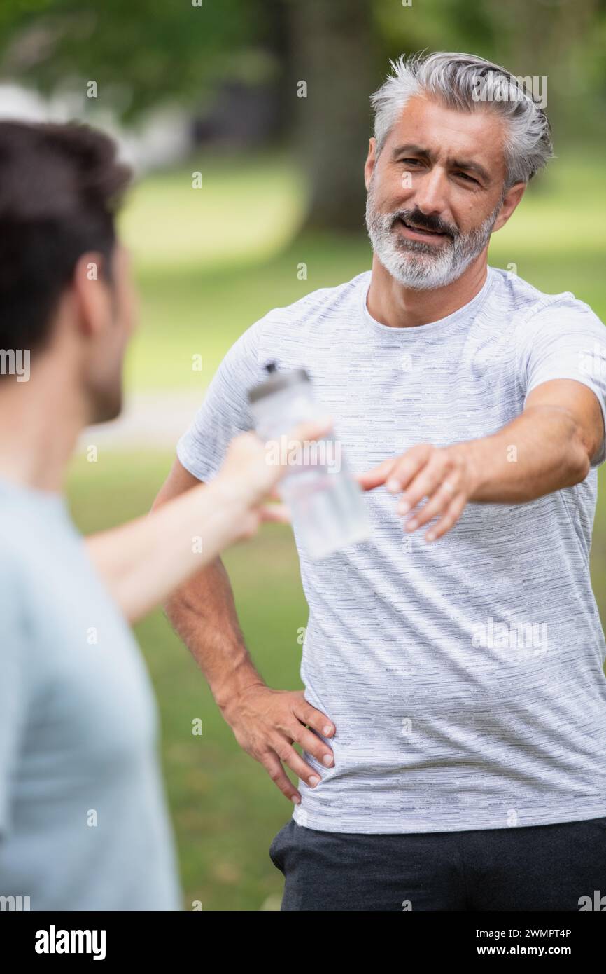 Break water runners hi-res stock photography and images - Alamy