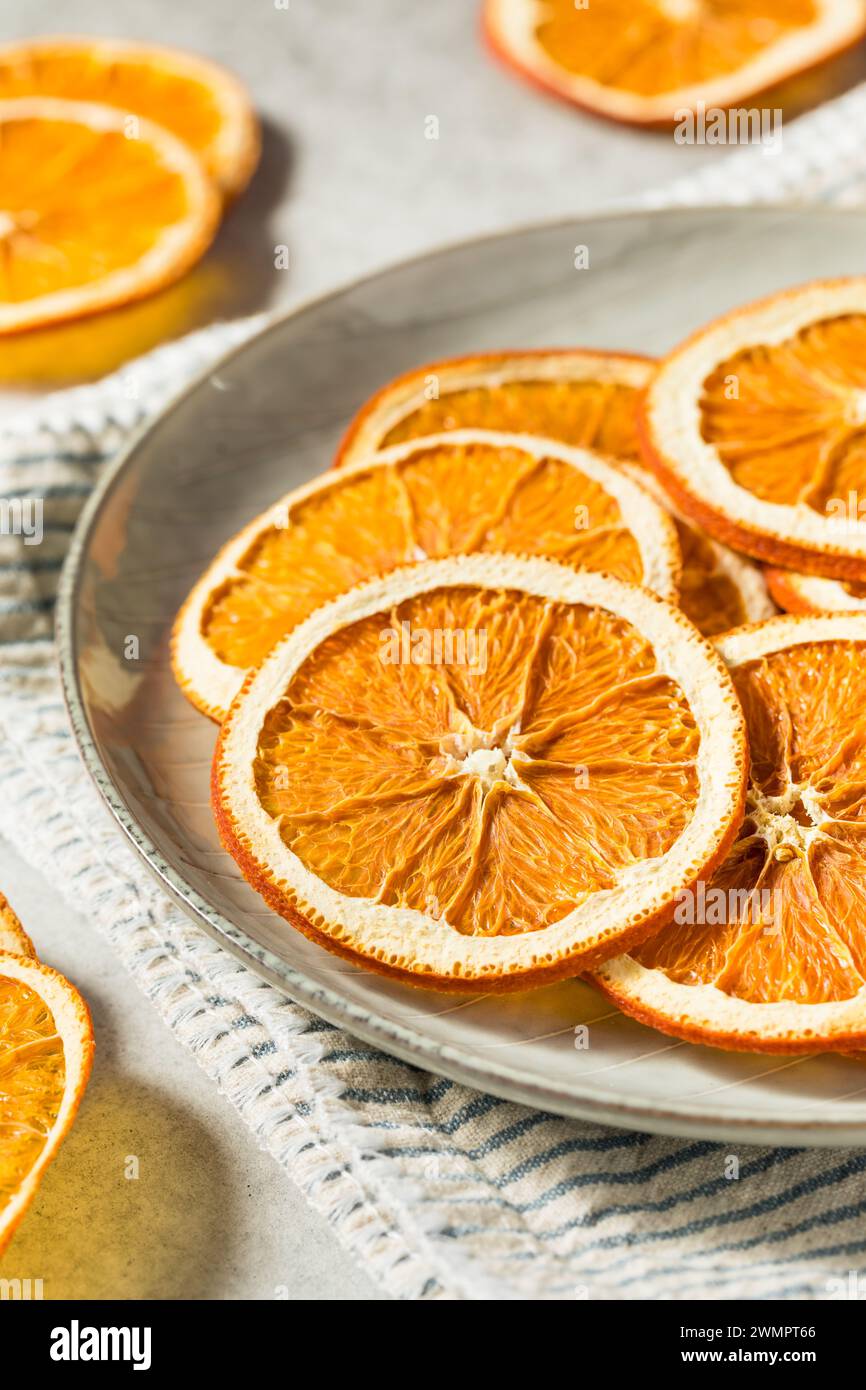Healthy Organic Dried Dehydrated Orange Slices in a Bowl Stock Photo ...