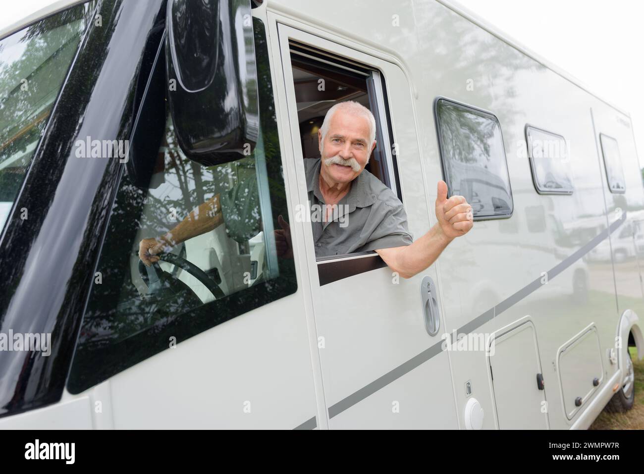 Thumbs up half length mid hi-res stock photography and images - Alamy