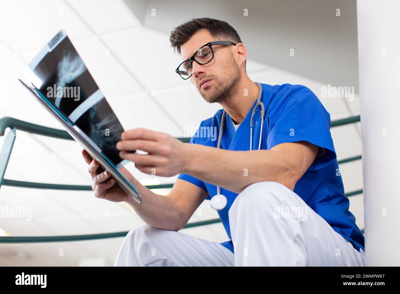 hospital doctor holding patients x-ray Stock Photo - Alamy
