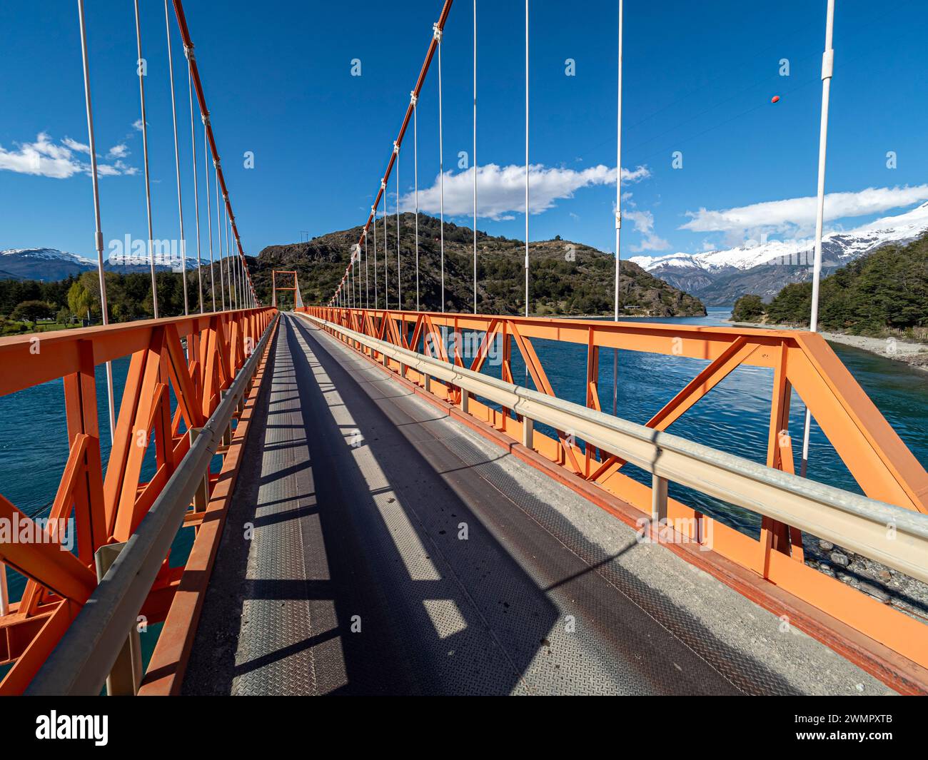 Wideangle view of suspension bridge Puente General Carrera, between ...