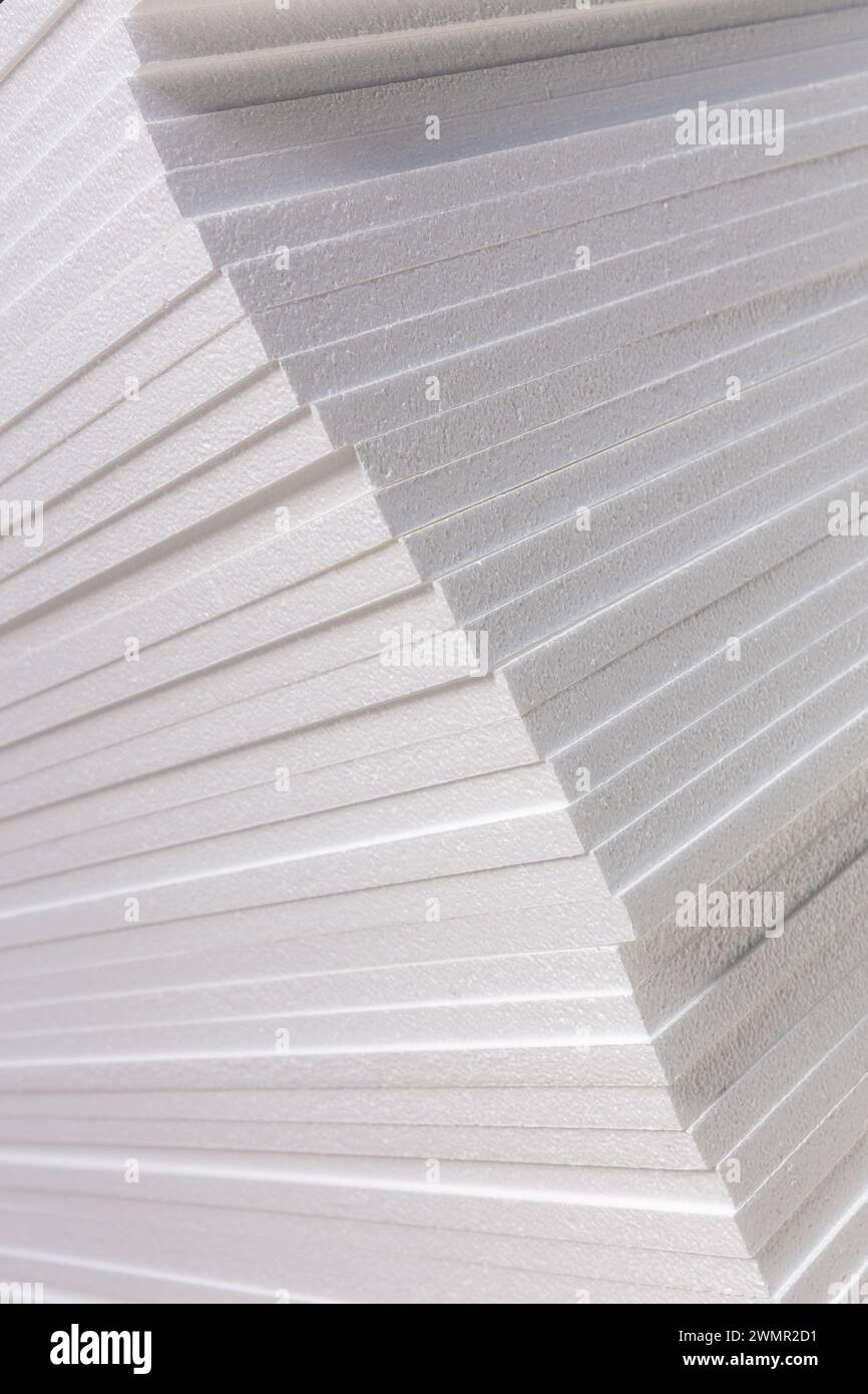 Background with stacked panels of Styrofoam. Industrial production of ...
