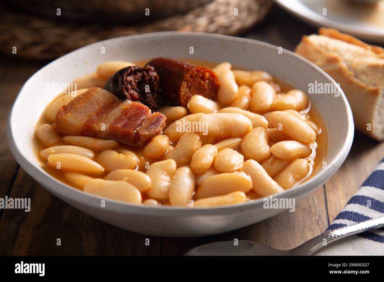 Homemade traditional Spanish fabada from the Asturias region, a white ...