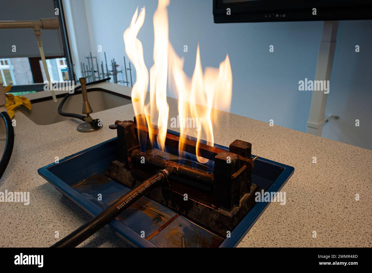 Heating of a large and connected small metal rod. Demonstrates the ...