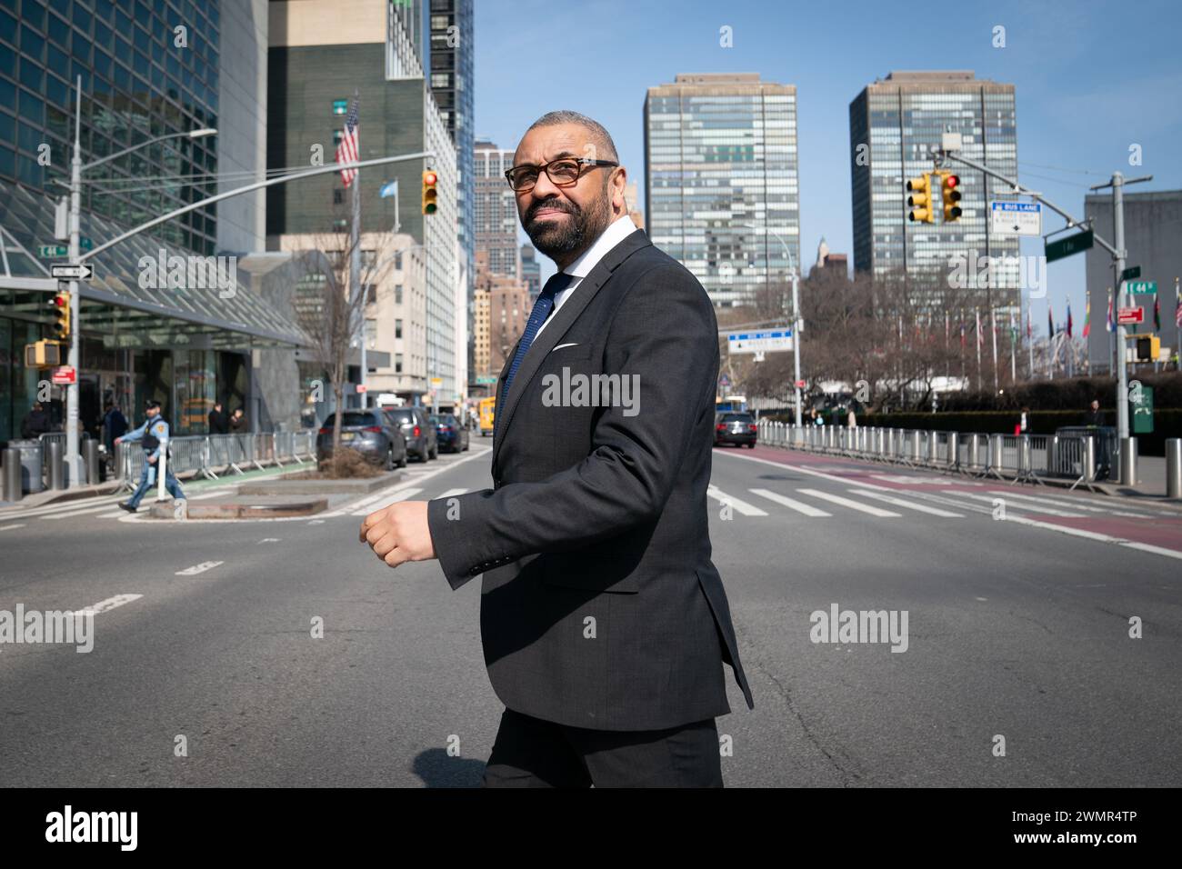 Home Secretary James Cleverly walks past the United Nations building ...