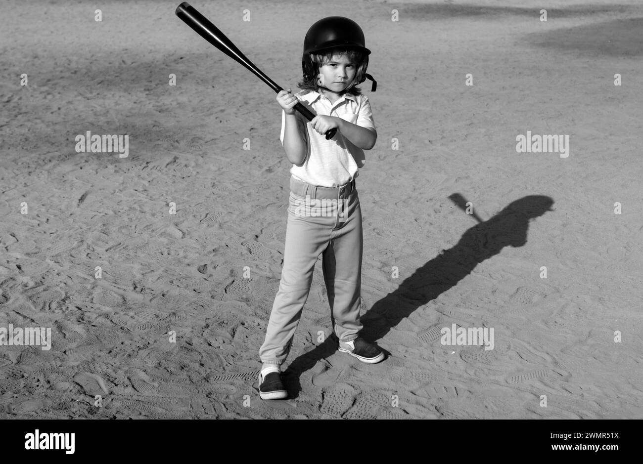 Kid holding a baseball bat. Pitcher child about to throw in youth ...