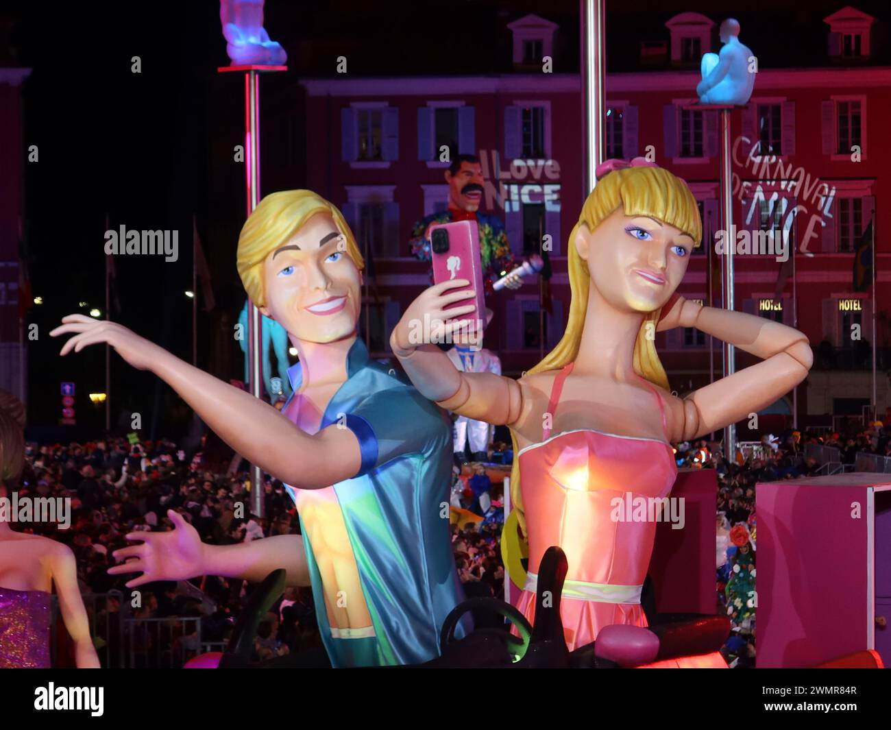 Ken and Barbie featured as giant statues on one of the floats in the ...