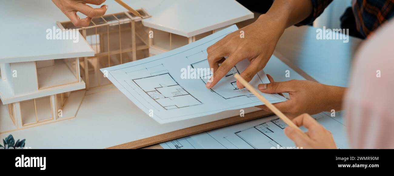Architect team analysis and brainstorming about house construction at ...