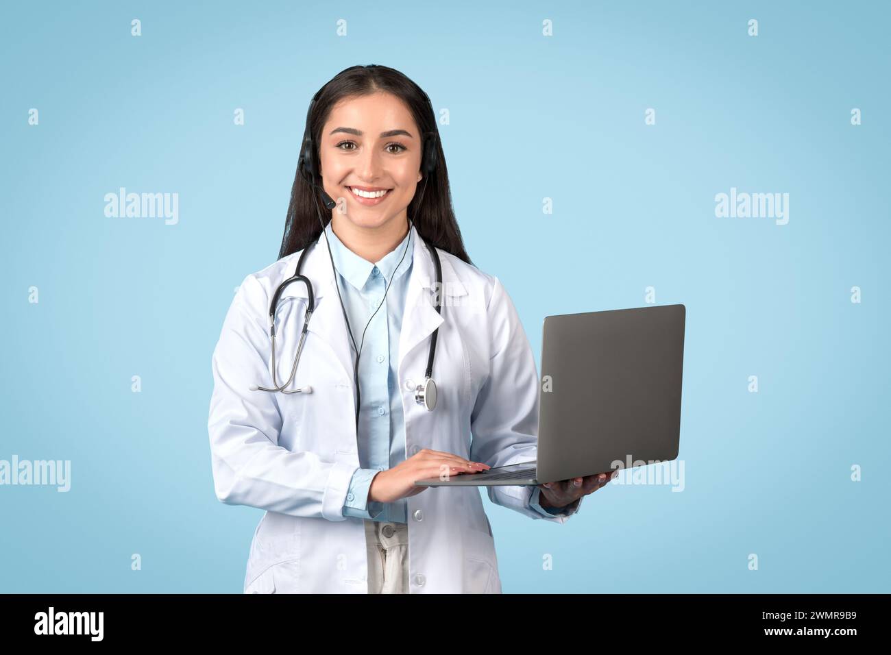 Female doctor multitasking hi-res stock photography and images - Alamy
