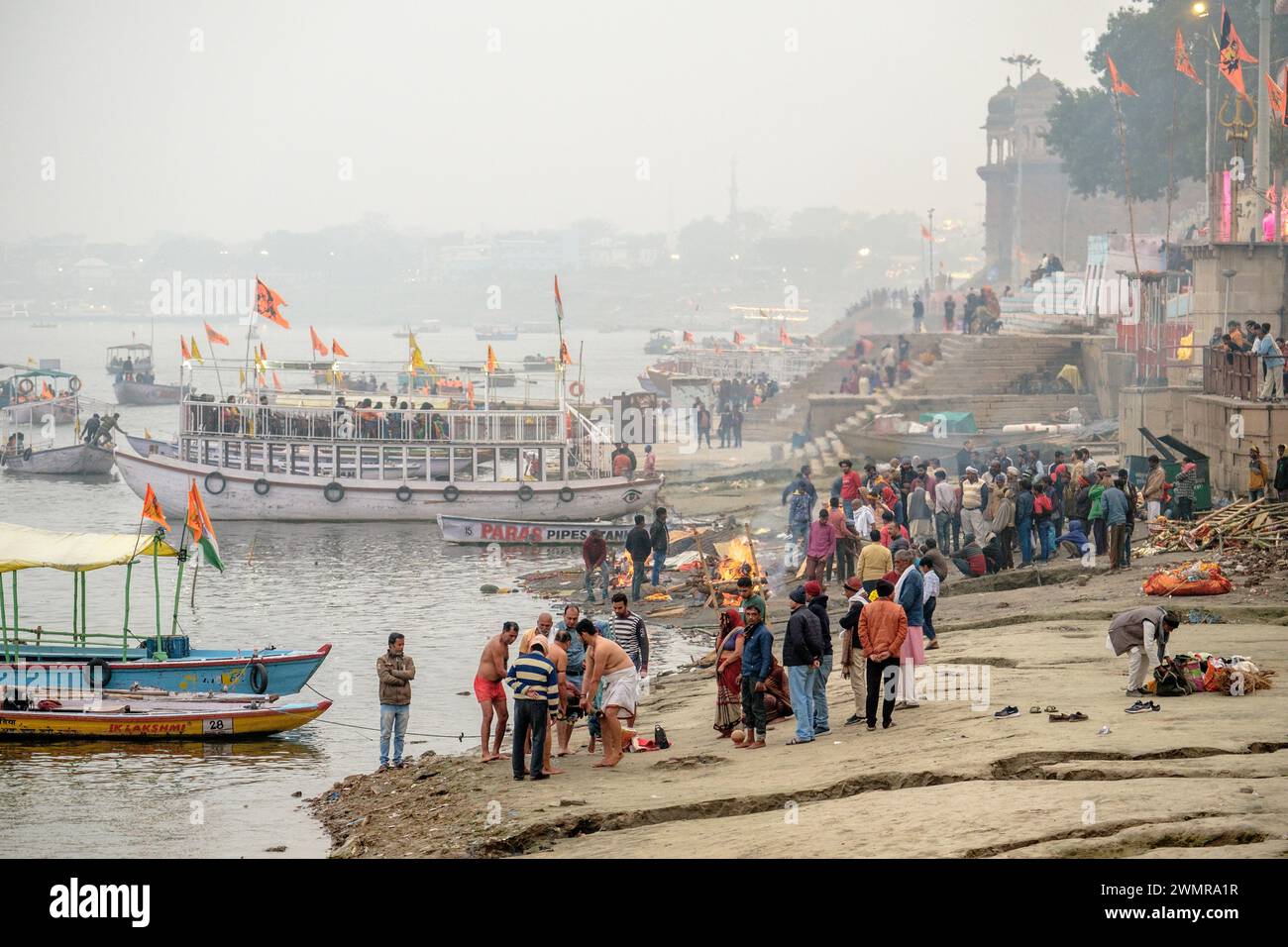 The burning Ghats (cremation areas) of The Ghats at Varanasi on the ...
