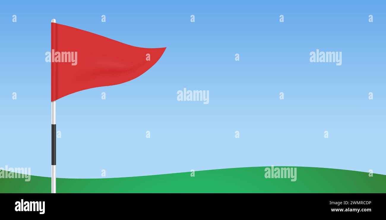 A triangle red flag waving on a flagpole, on a lush green course ...