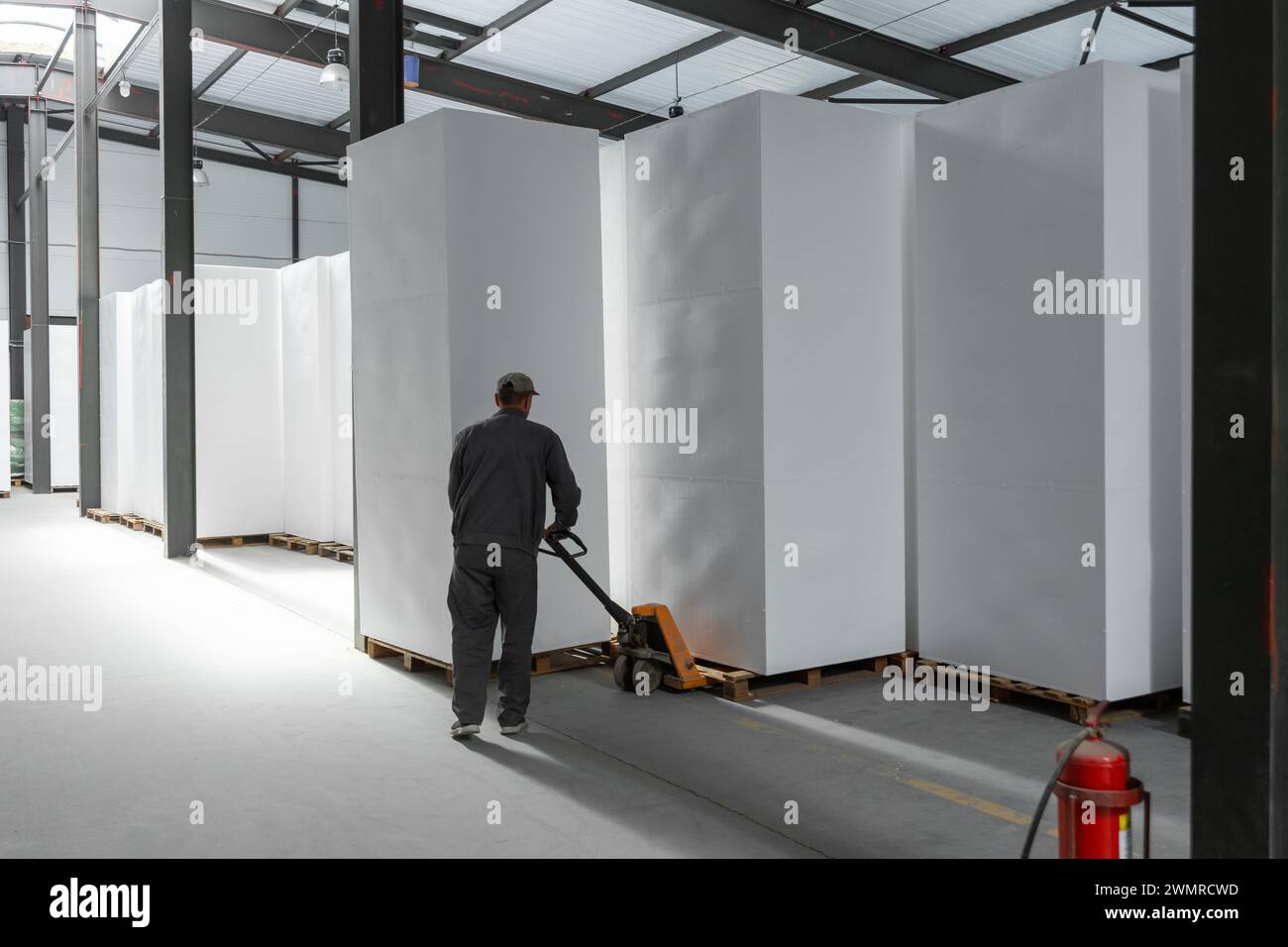 The loader brought a newly produced block of expanded foam to the ...