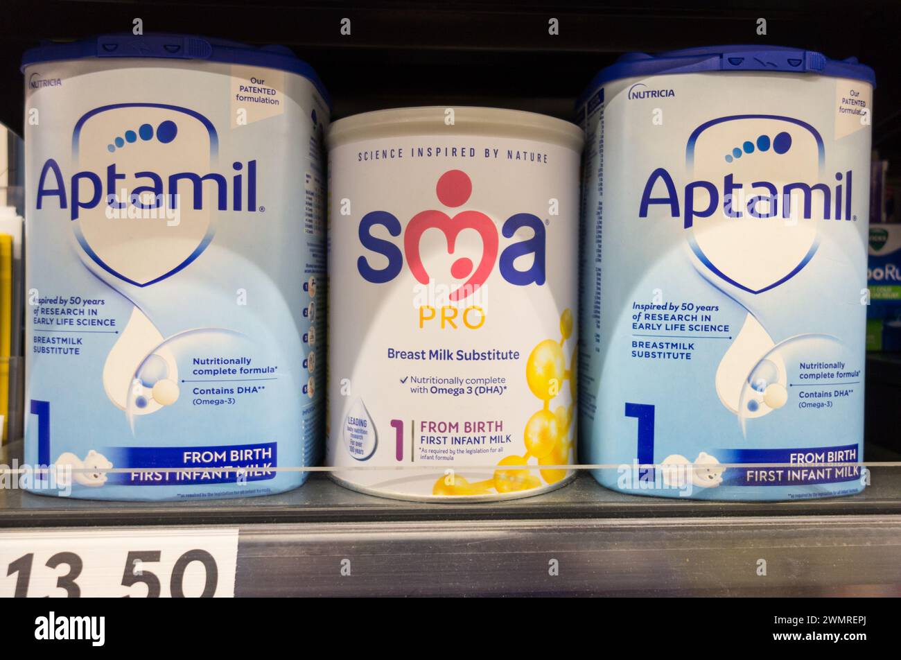 Closeup of SMA Pro Breastmilk Substitute and Aptamil First Infant Milk ...
