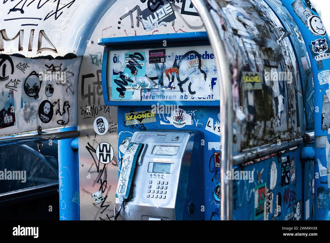 Berlin phone box graffiti hi-res stock photography and images - Alamy