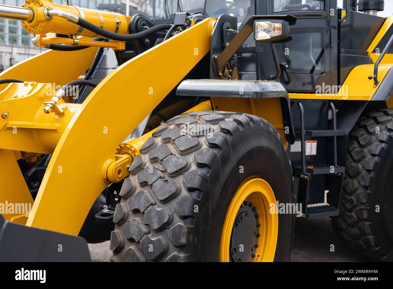 Fleet of yellow construction machines Stock Photo - Alamy