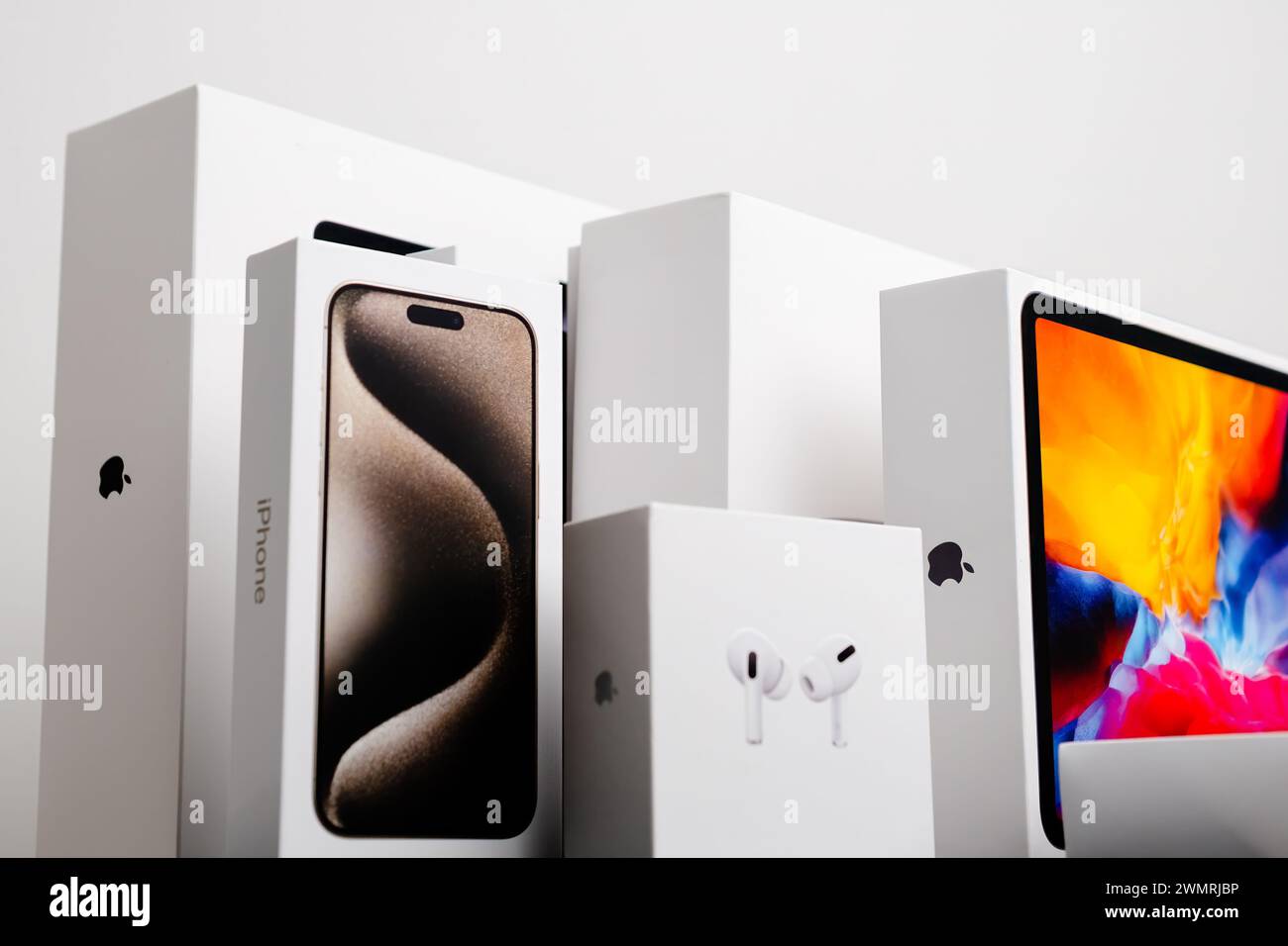 BERLIN , GERMANY - FEBRUARY 14 2024: MacBook Pro. iPhone, iPad, Air ...