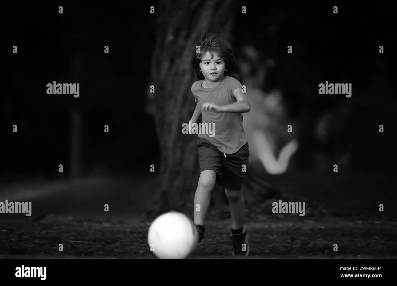 Children playing outdoor player Black and White Stock Photos & Images ...