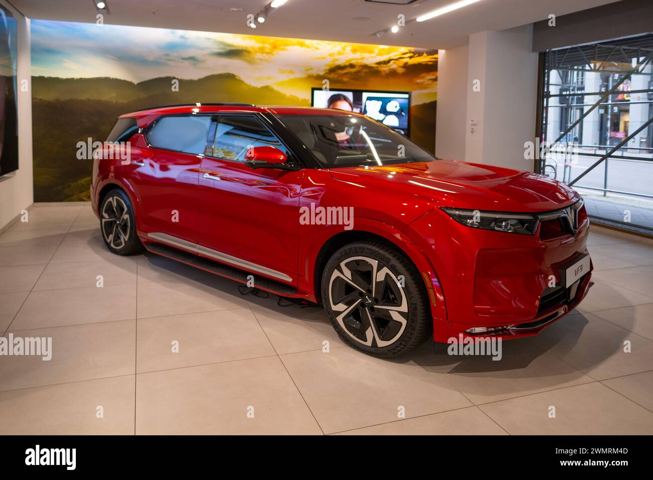 new red Vinfast vf 9 electric SUV in Studio, advanced technologies in ...