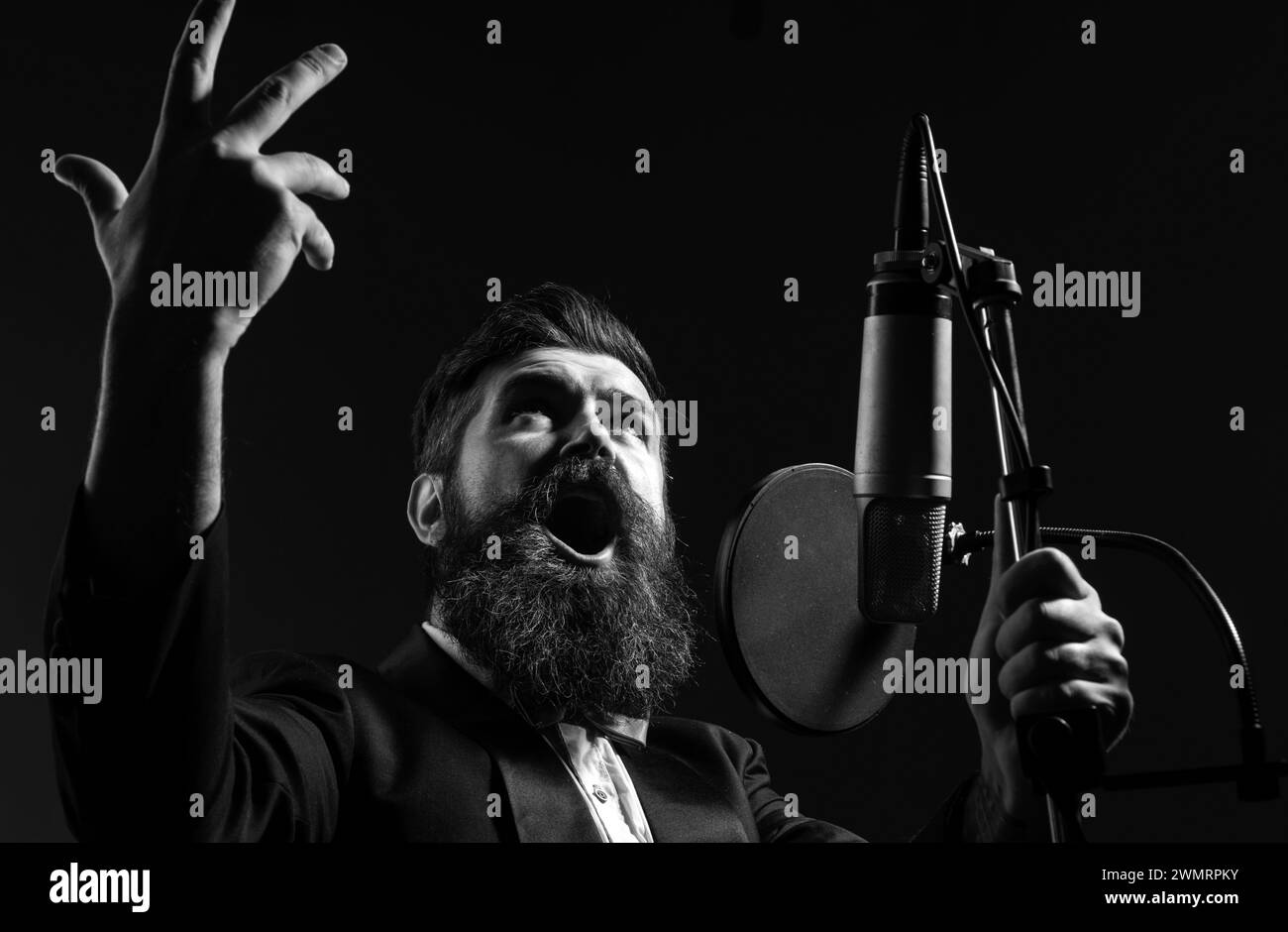 Man singing in recording studio Black and White Stock Photos & Images ...