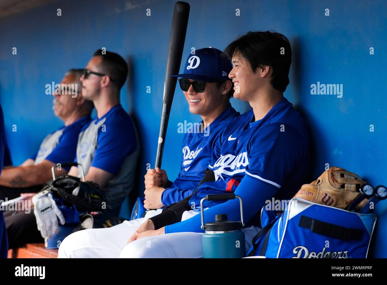 Los Angeles Dodgers relief pitcher Yoshinobu Yamamoto, center, and ...