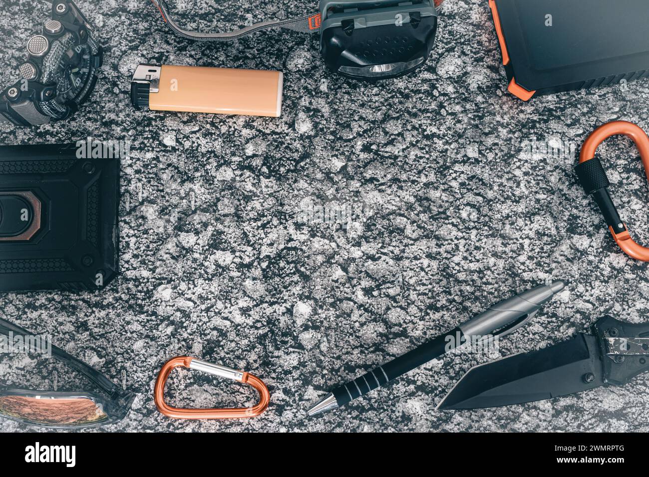 Flat lay of some Outdoor/EDC gear on a grey background Stock Photo - Alamy