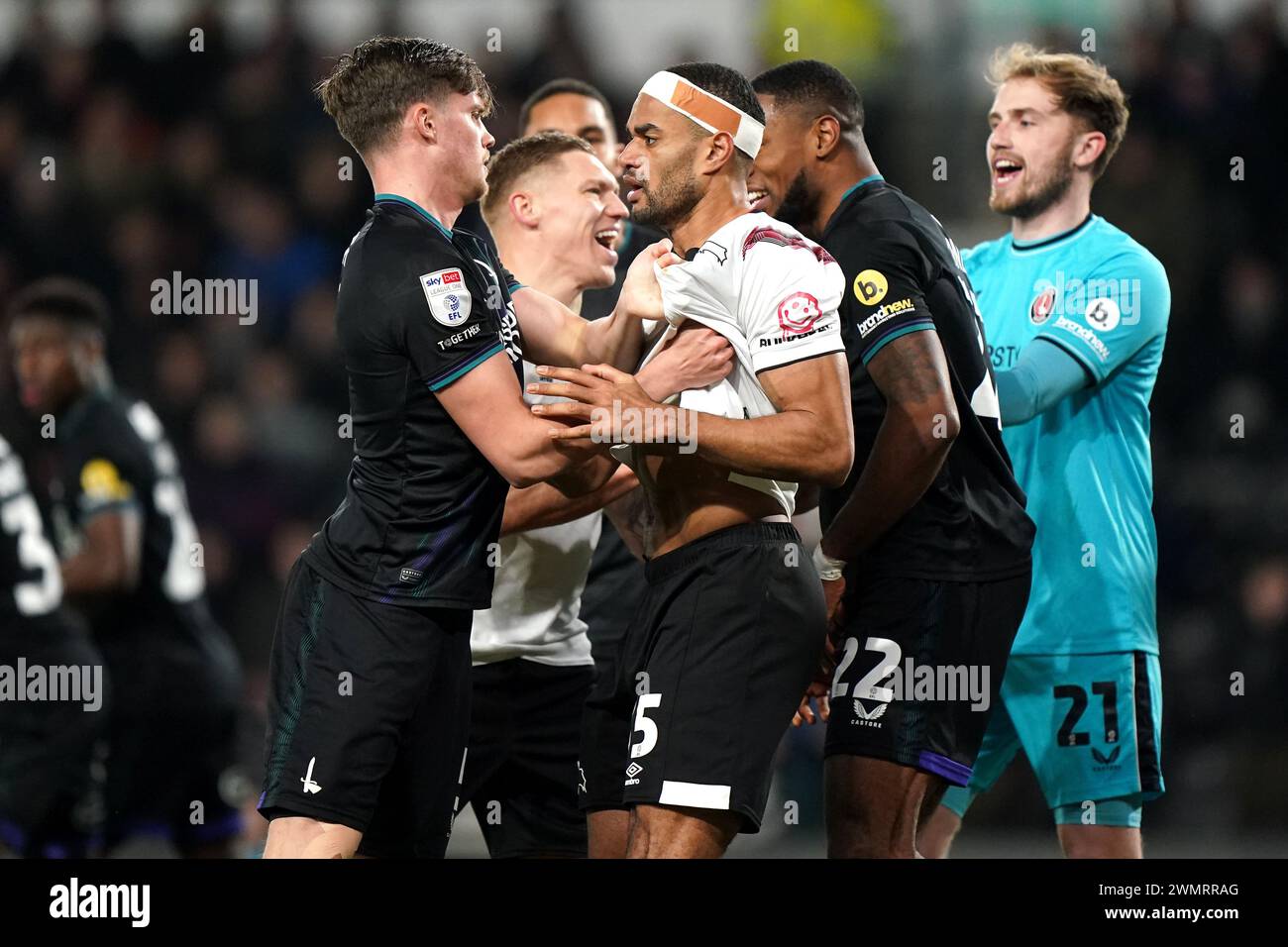 Charlton Athletic's Lucas Ness (left) and Derby County's Dwight Gayle ...