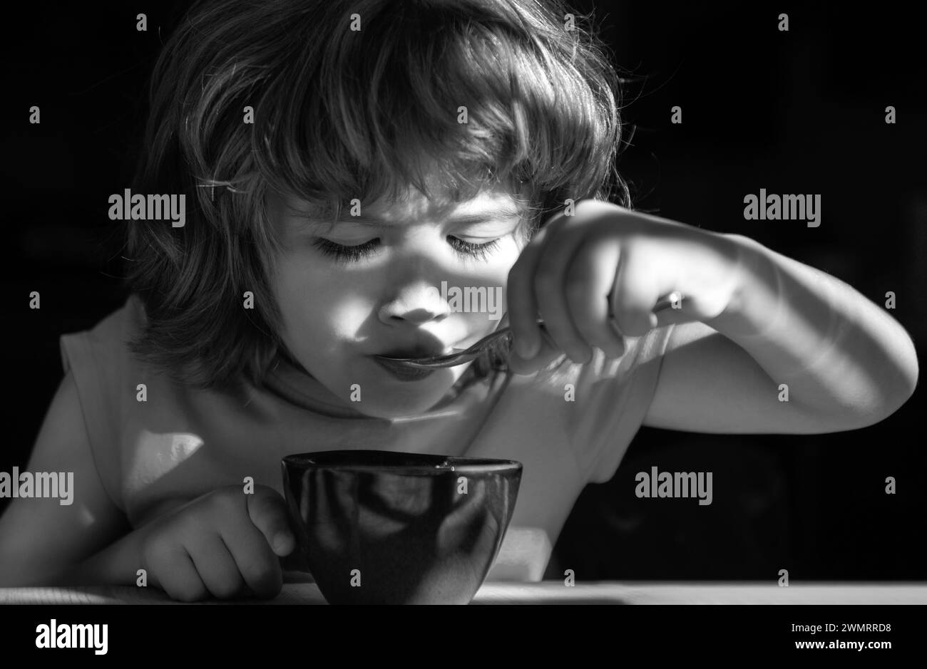 Kids Nutrition. Healthy eating habits. Kids home food. Boy eats ...