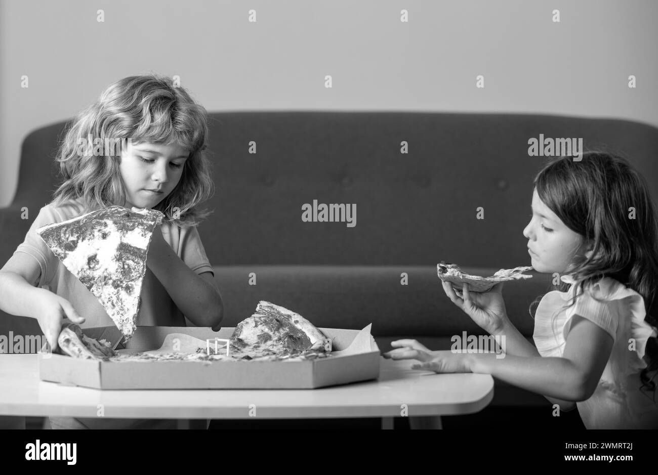 Pizza and kids, slices pizza in kids hand. Children eating tasty fast ...