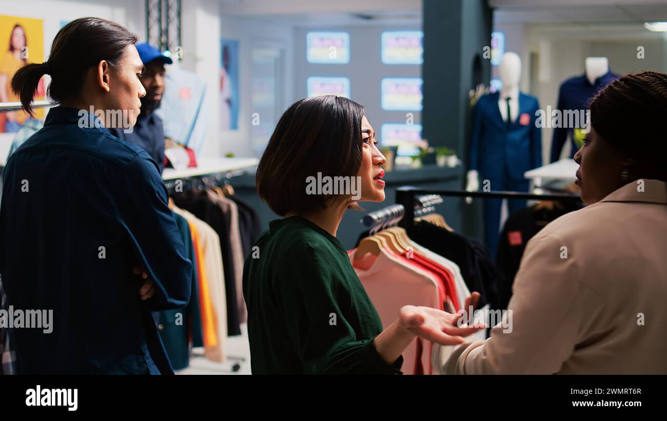 Guard arguing with angry shoppers, working on crowd control during ... Guard arguing with angry shoppers, working on crowd control during ...