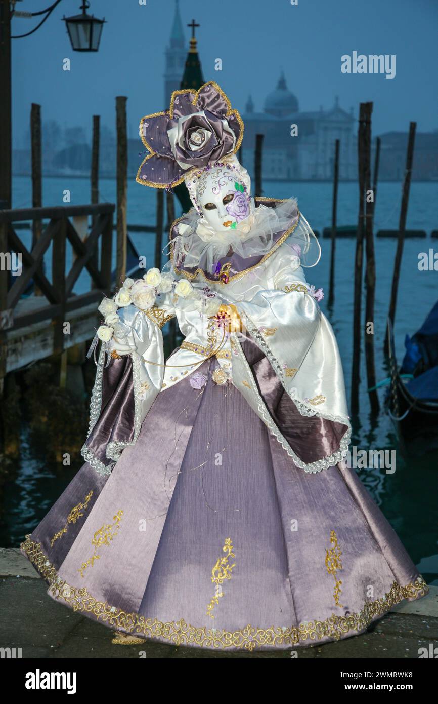 Venice, Italy. 7th Feb, 2024. A participant seen wearing fancy costume ...