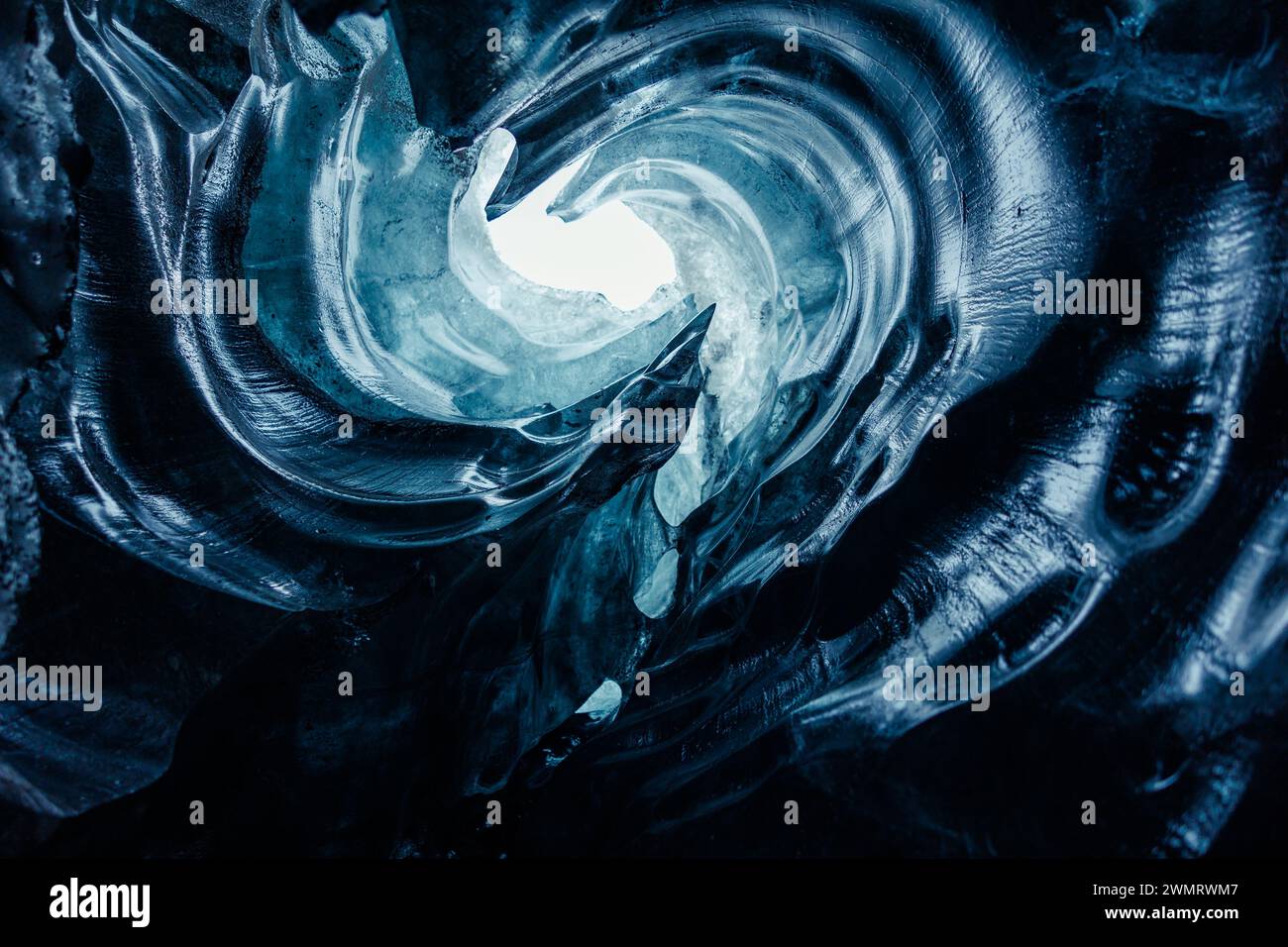 Beautiful iceberg crevasse in iceland forming massive icy tunnels with ...