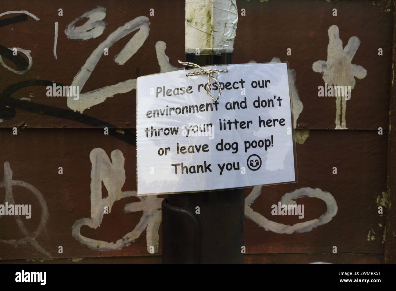 Home made sign for Dog owners to clean up the poop mess Stock Photo - Alamy