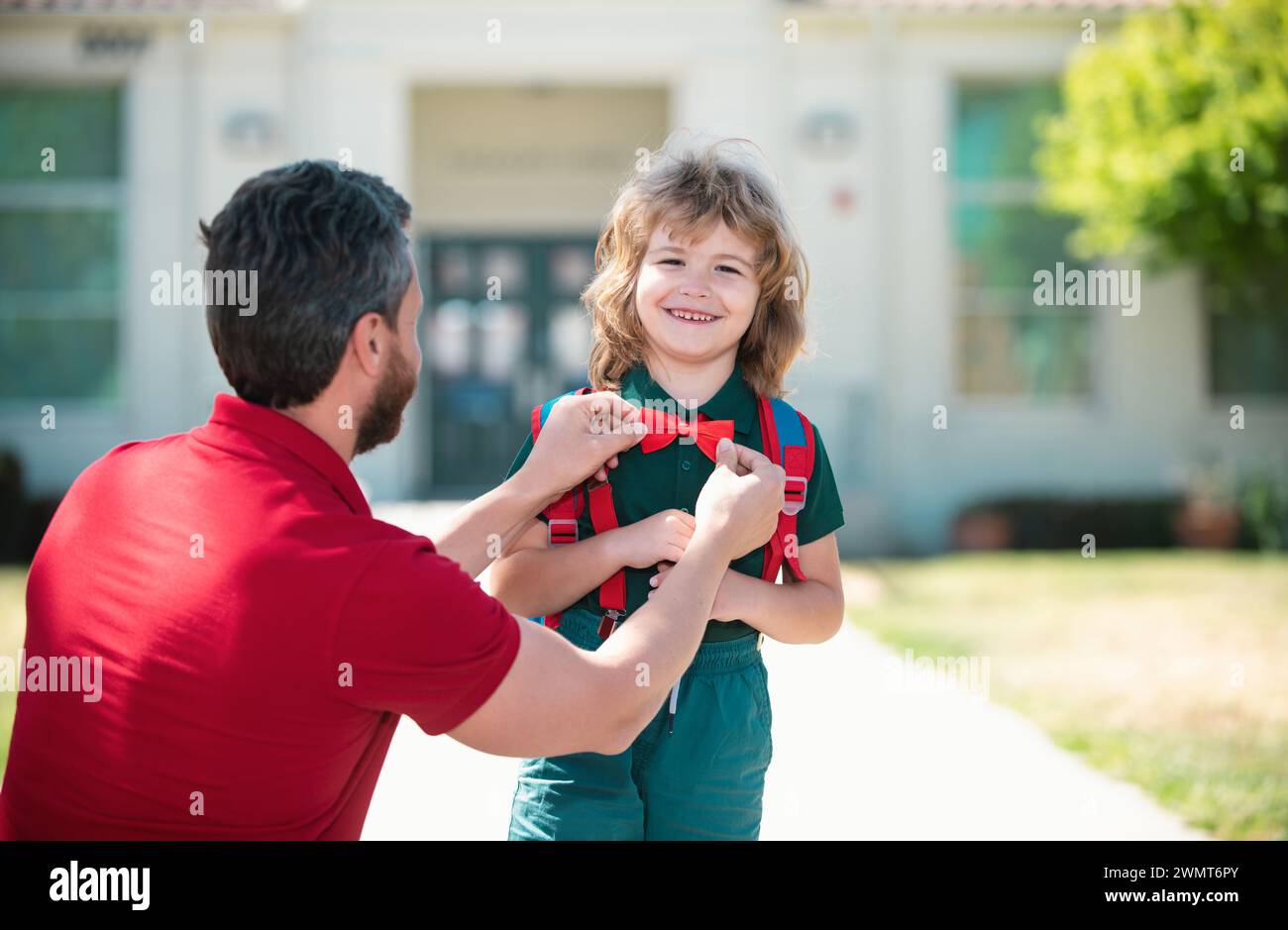 Happy father and son go to elementary school. Parent taking child to ...